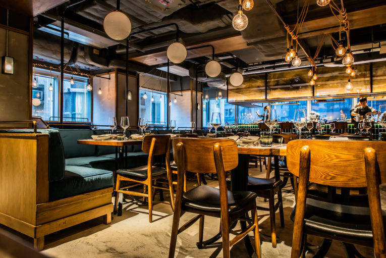 New Restaurant Kinship Breathes Soul Into SoHo With Its Rustic Yet ...