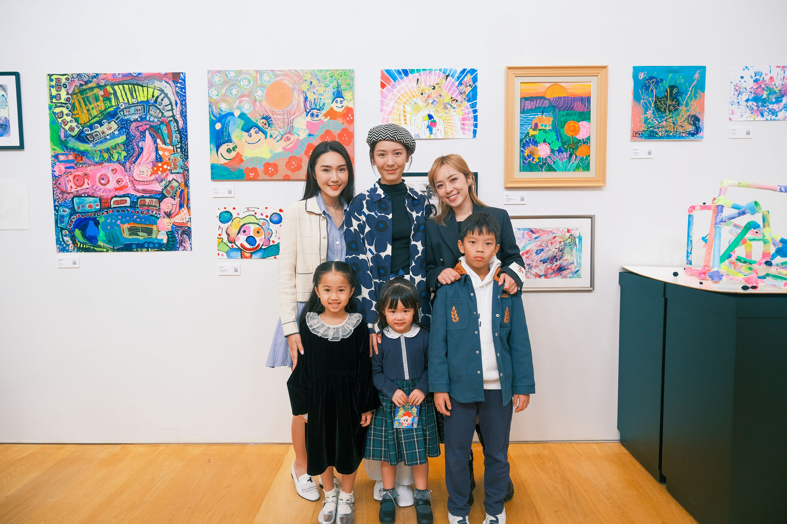 Little Artists' Imaginations Shine in Charity Exhibition Opening