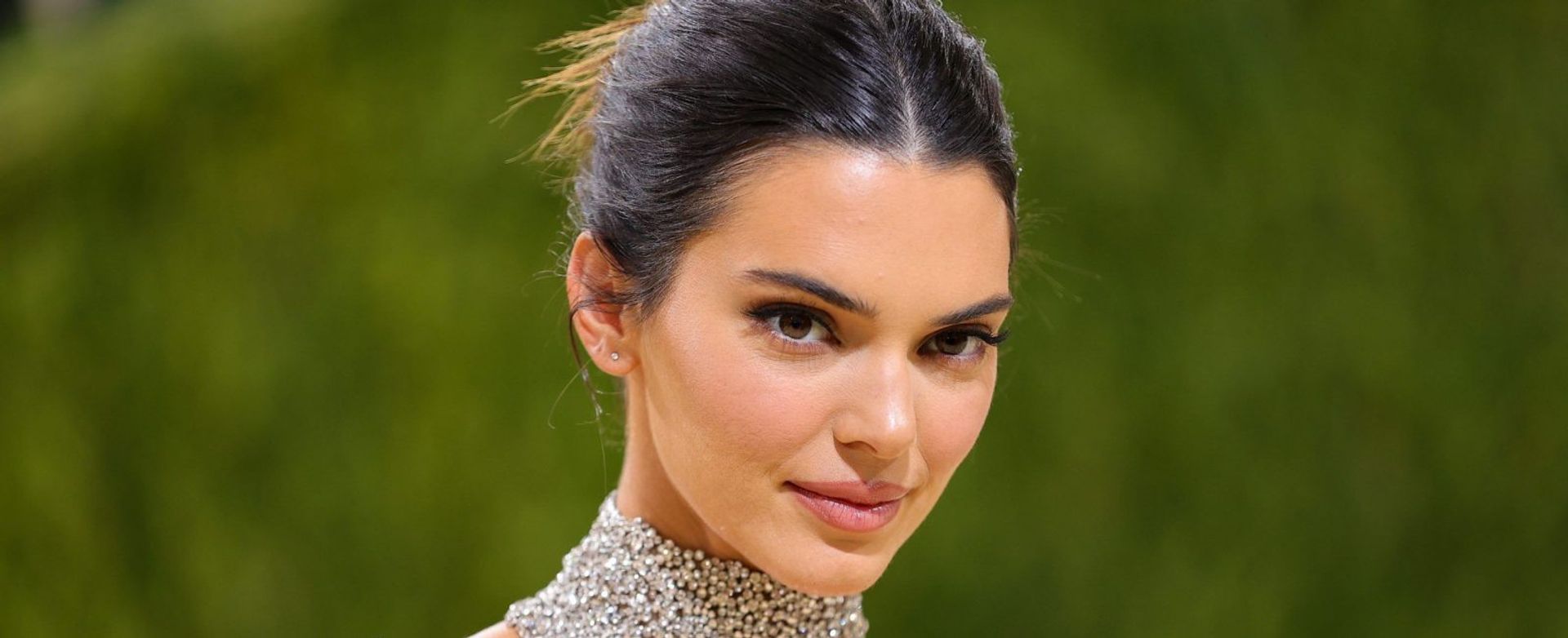 The sleek bun in this season's latest style, and here's how to ace it