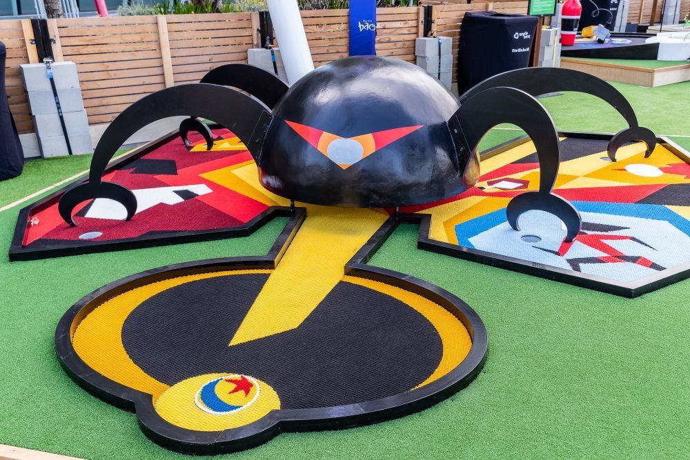 Tee off at Pixar Putt, a mini-golf course inspired by the films