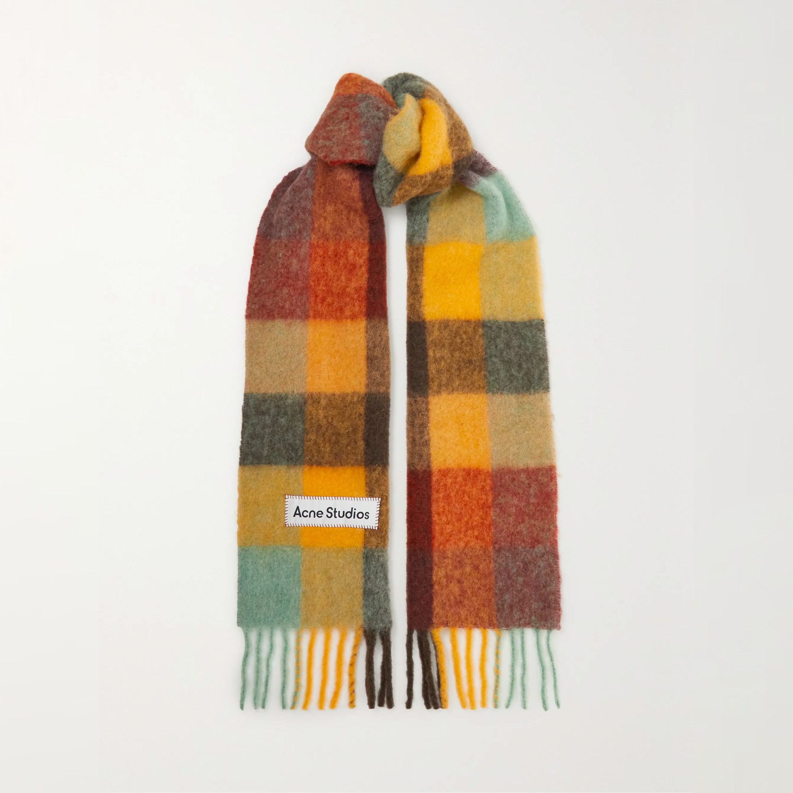 11 best statement scarves to snuggle up in on your winter holiday
