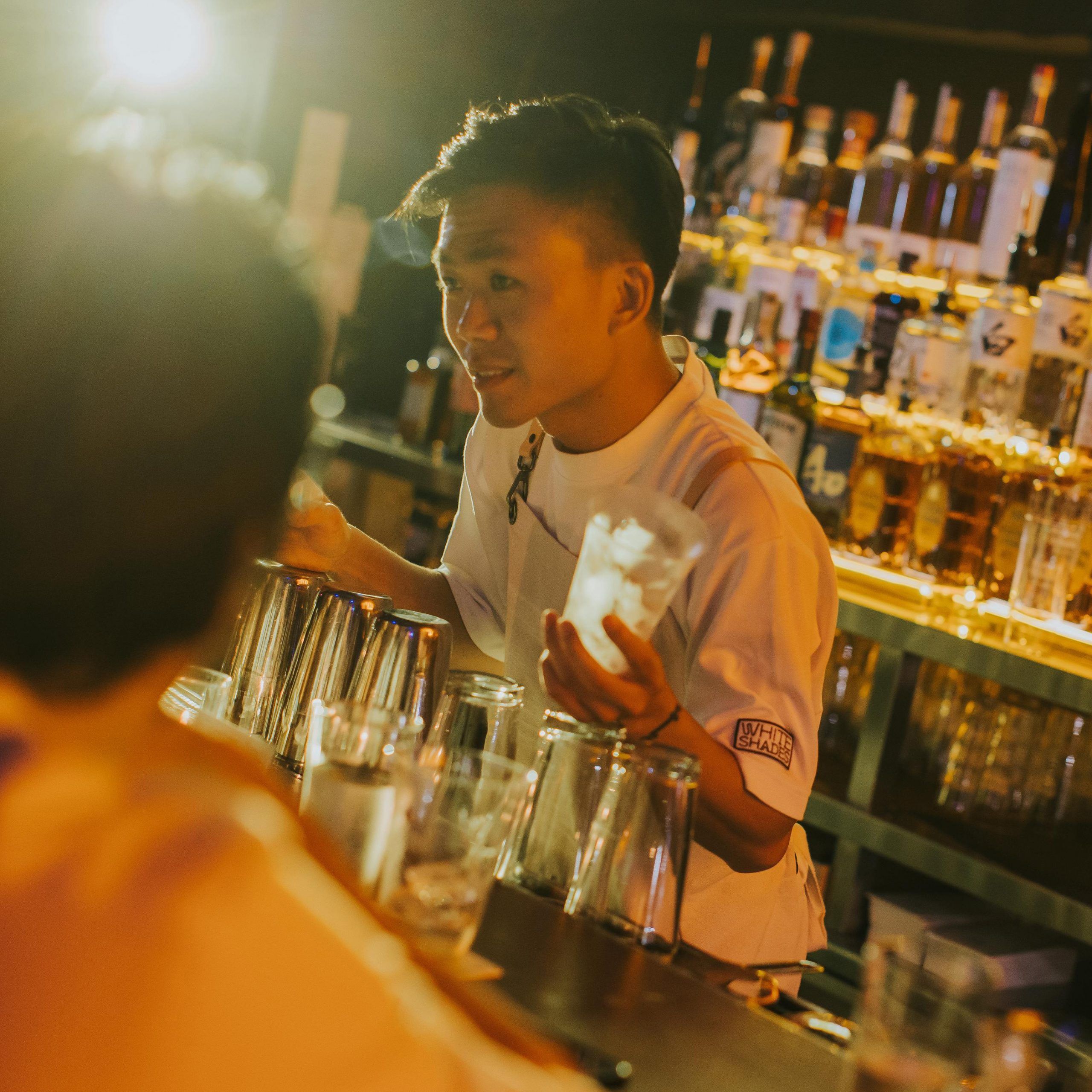 Bar owner Bai Jiawei's year-end party is a burst of colours